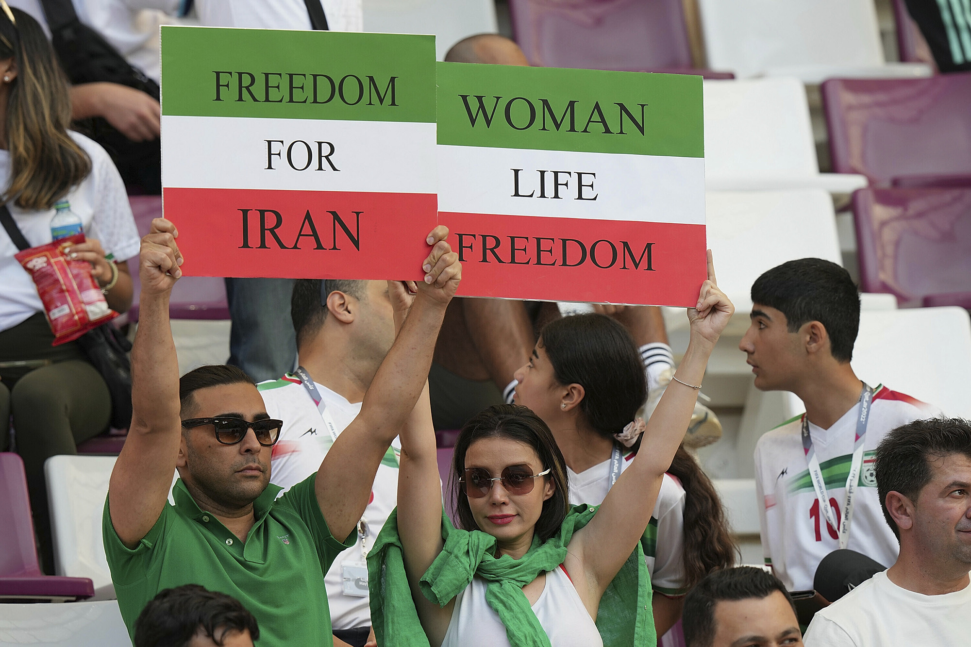 iroon.com: Photos: World Cup: Iranian fans hold up "Women, Life ...